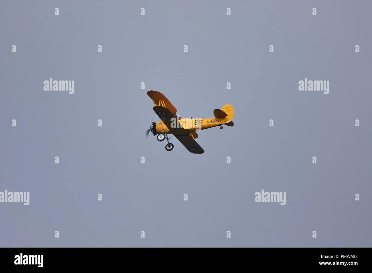 US Navy N3N-3 biplane flying in Washington state, USA; September 2018 ...