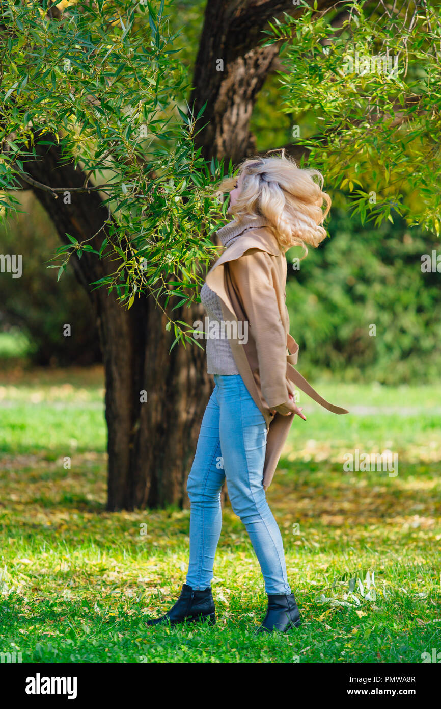 Lady under maple tree hi-res stock photography and images - Alamy