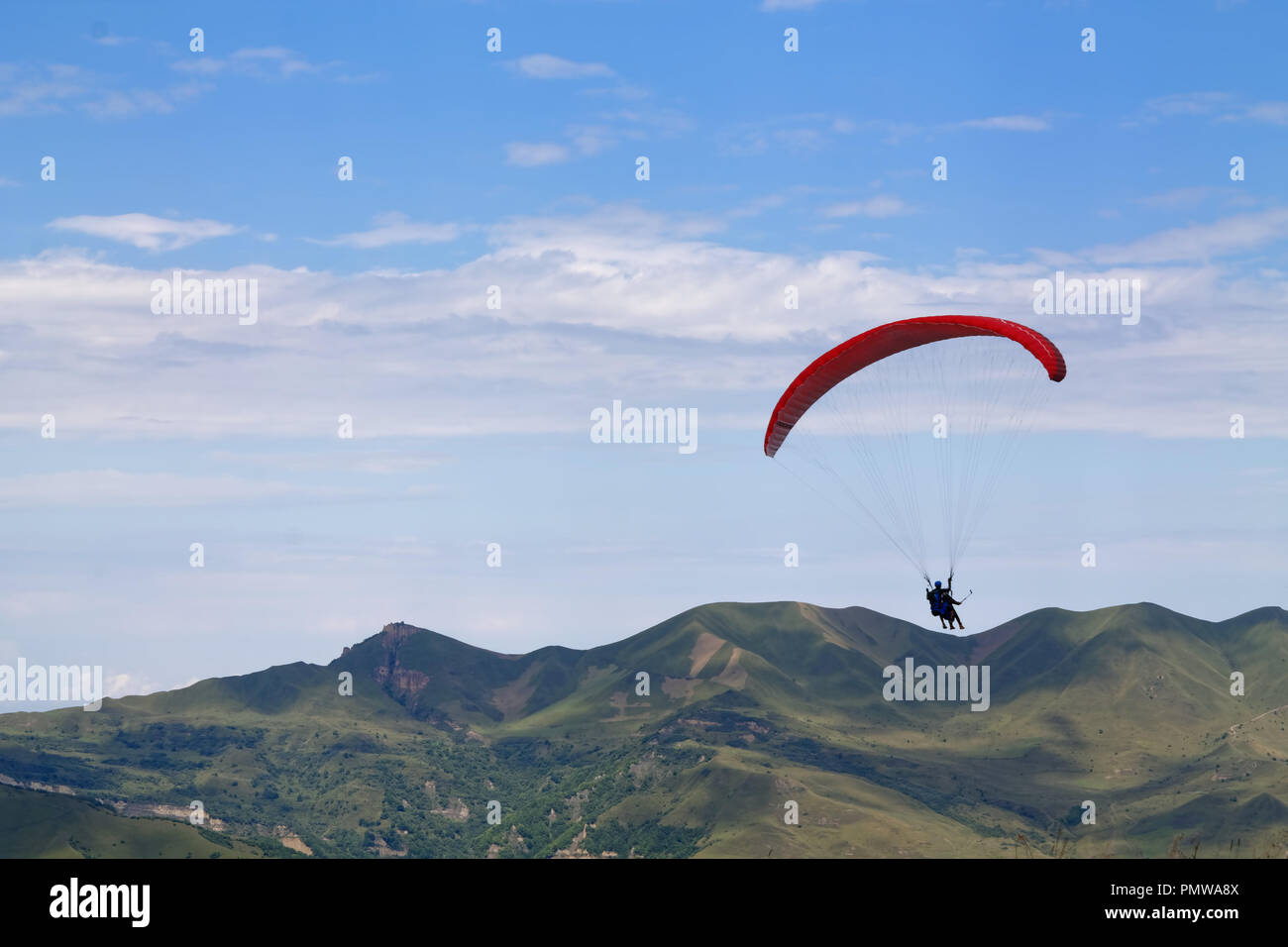 Mountain parasailing, Skydiving flying over the mountains. parachute ...