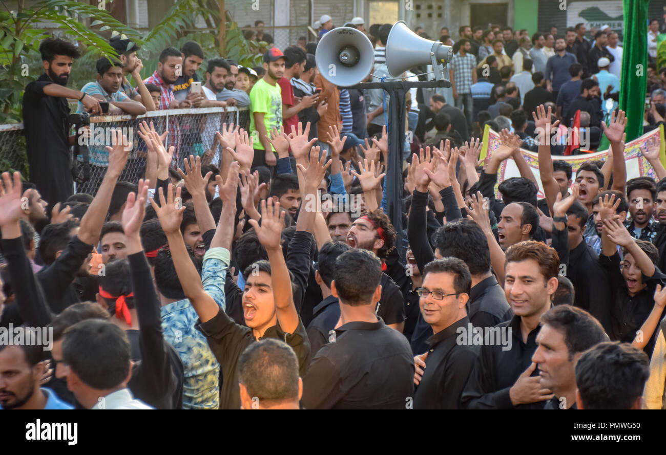 Kashmiri Shia Muslims seen shouting pro freedom slogans during the ...
