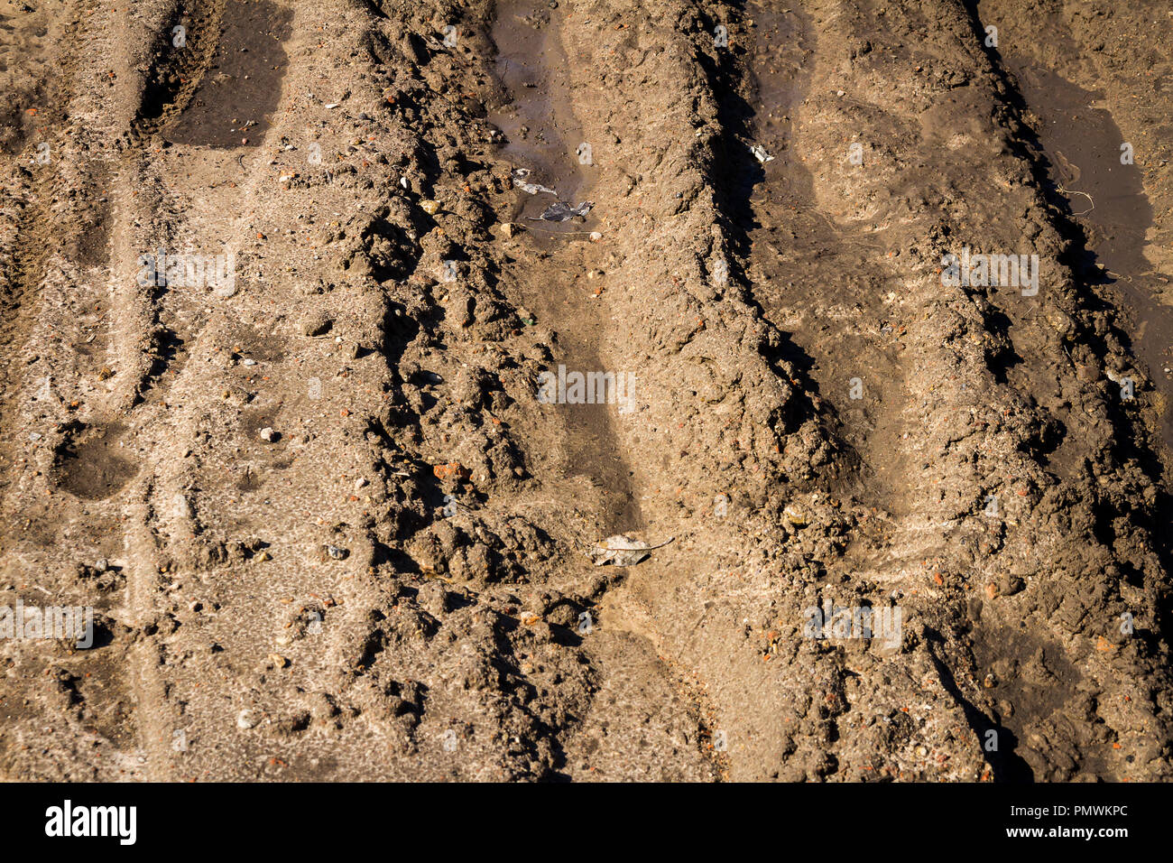 Deep puddle on a dirty road hi-res stock photography and images - Alamy
