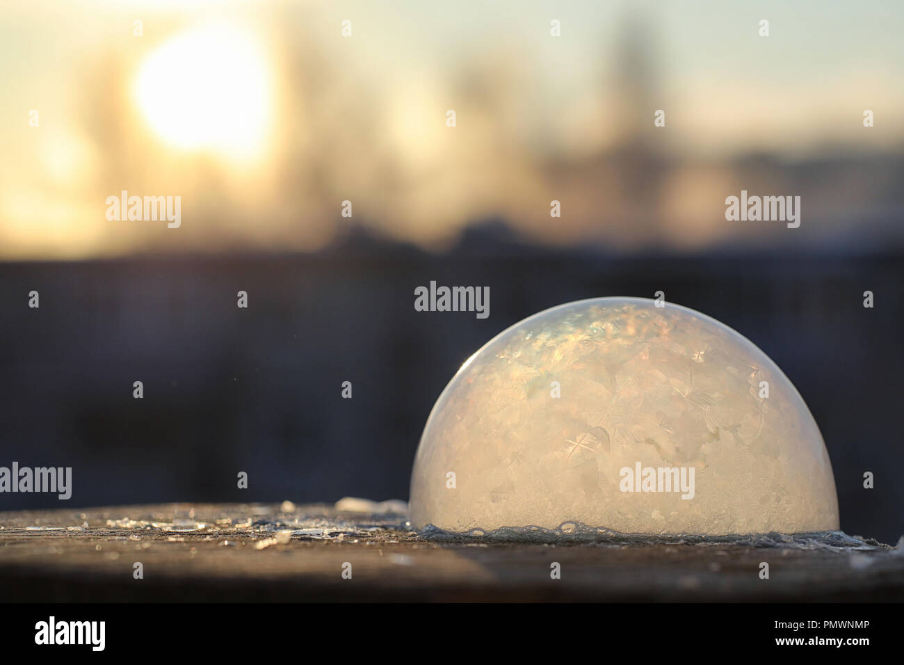 Soap bubbles freeze in the cold. Winter soapy water freezes in t Stock ...