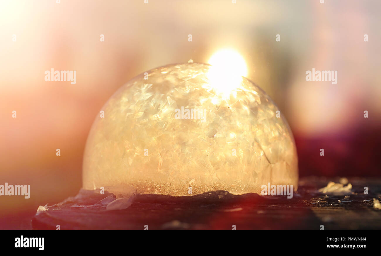 Soap bubbles freeze in the cold. Winter soapy water freezes in t Stock ...