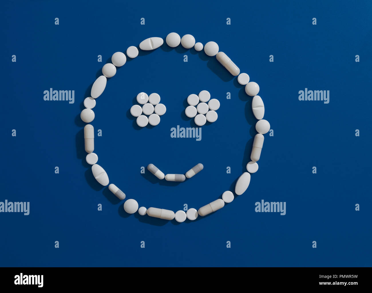 Smiley face pills hi-res stock photography and images - Alamy