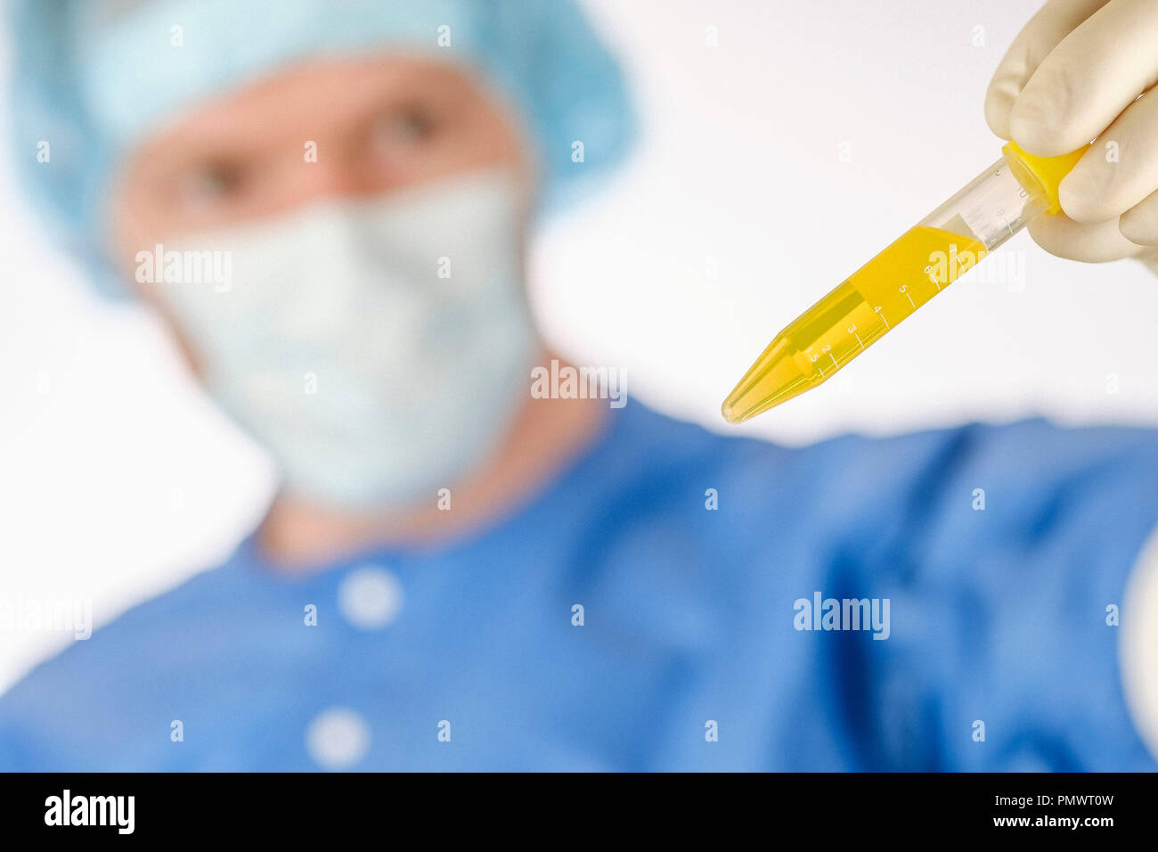 Doctor holding urine sample specimen in test tube Stock Photo - Alamy