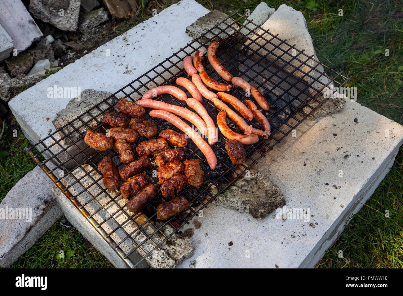 Romanian traditional barbecue with mici and sausages - outsie in nature ...