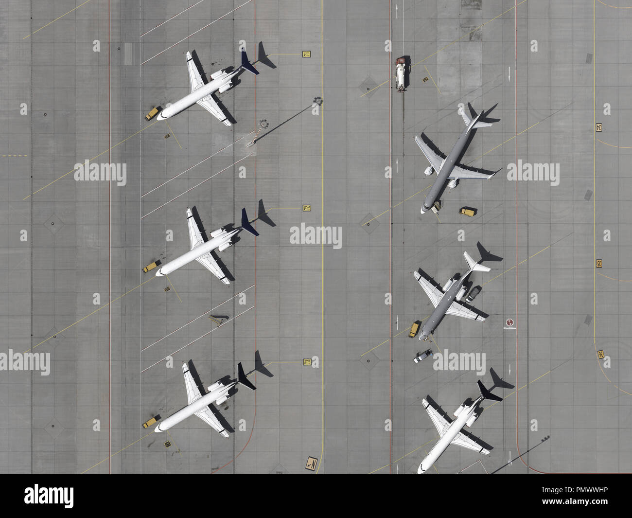 Aerial view airplanes parked on tarmac at airport Stock Photo - Alamy
