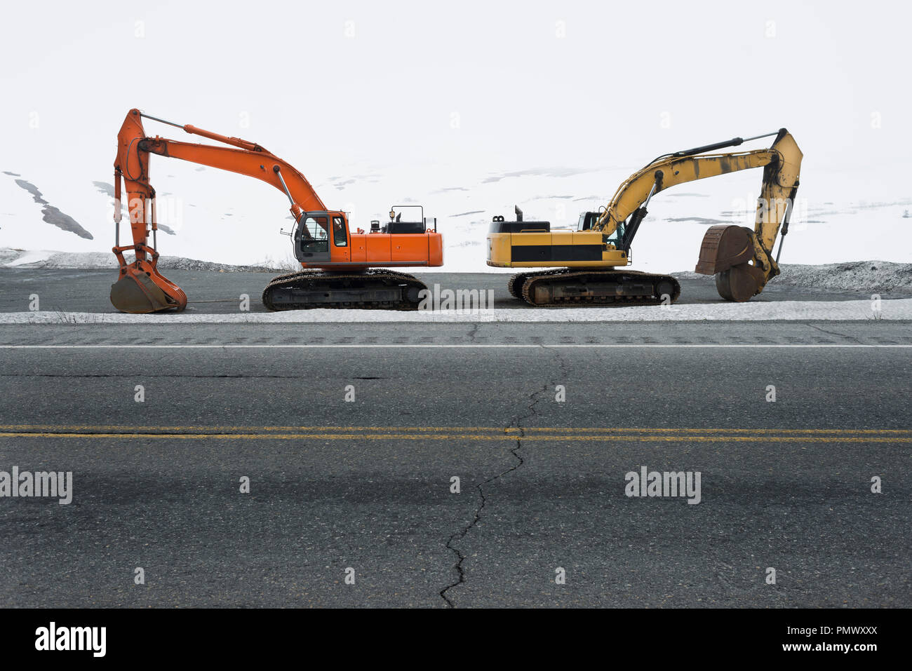 Road clearing excavators parked at roadside along Colony Glacier, Knik ...