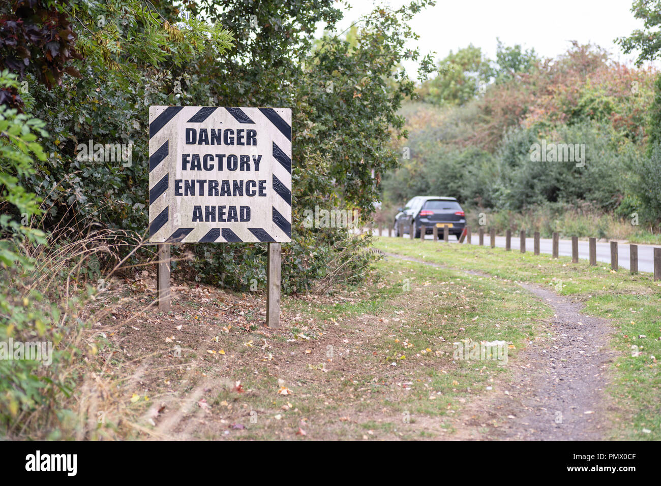 Danger Factory Entrance Ahead warning road sign on British road ...