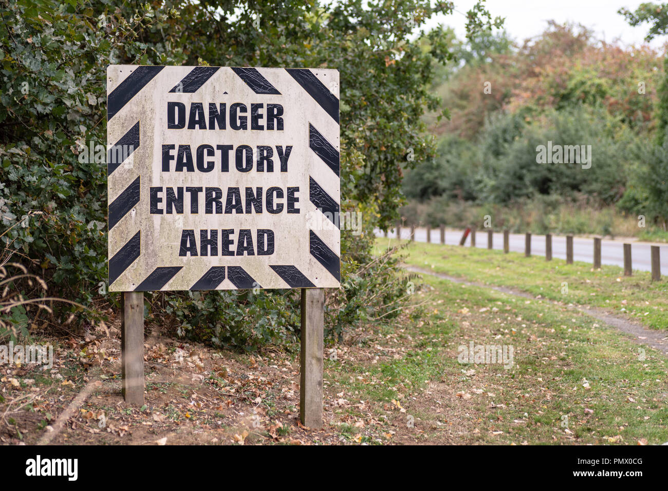 Danger Factory Entrance Ahead warning road sign on British road ...