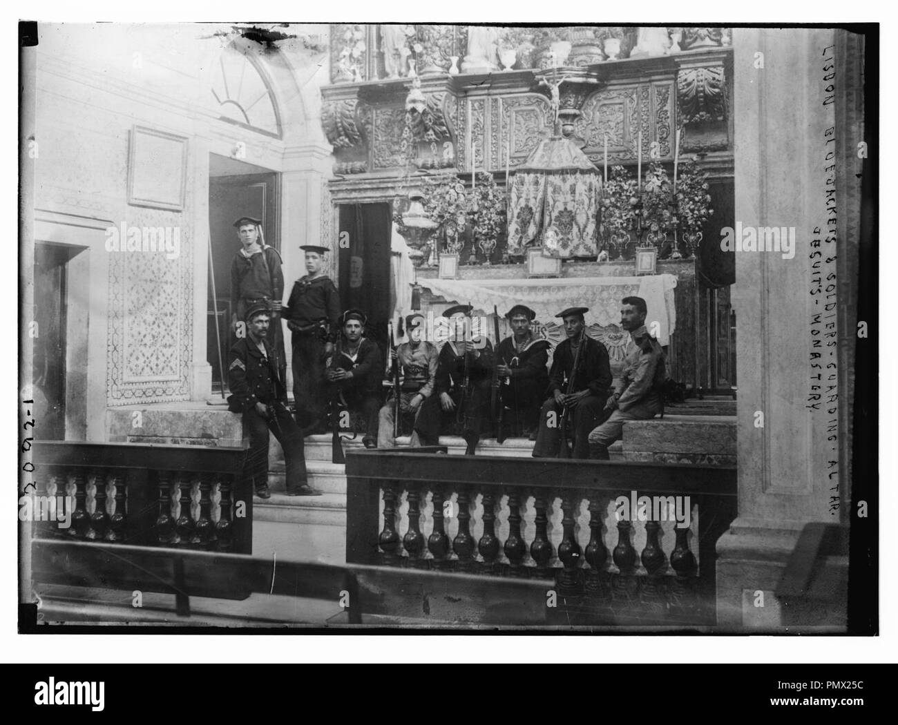 Blue jackets and soldiers guarding altar Jesuit's monastery Stock Photo ...