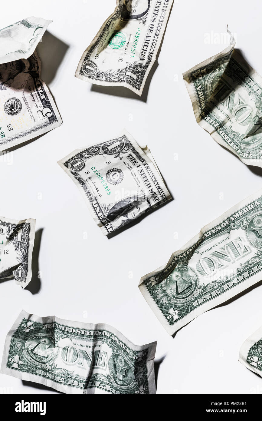 Folded and crumpled one dollar bills on white background Stock Photo ...