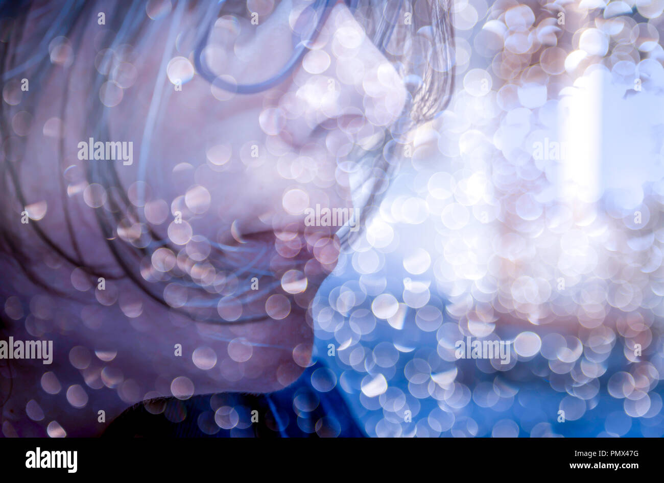 Woman Face with Light Effect Stock Photo - Alamy