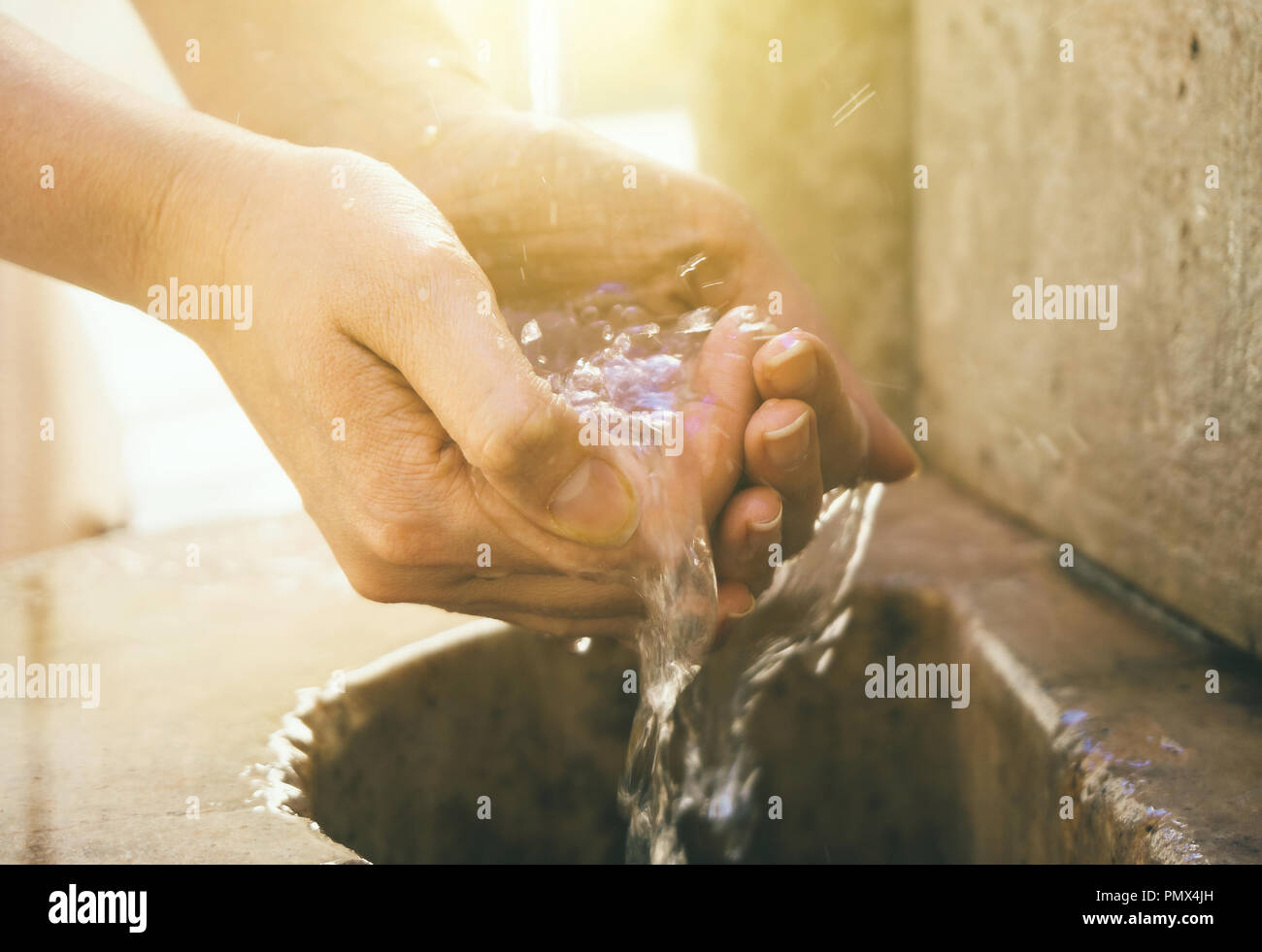 Clean water source in the city at summer Stock Photo - Alamy