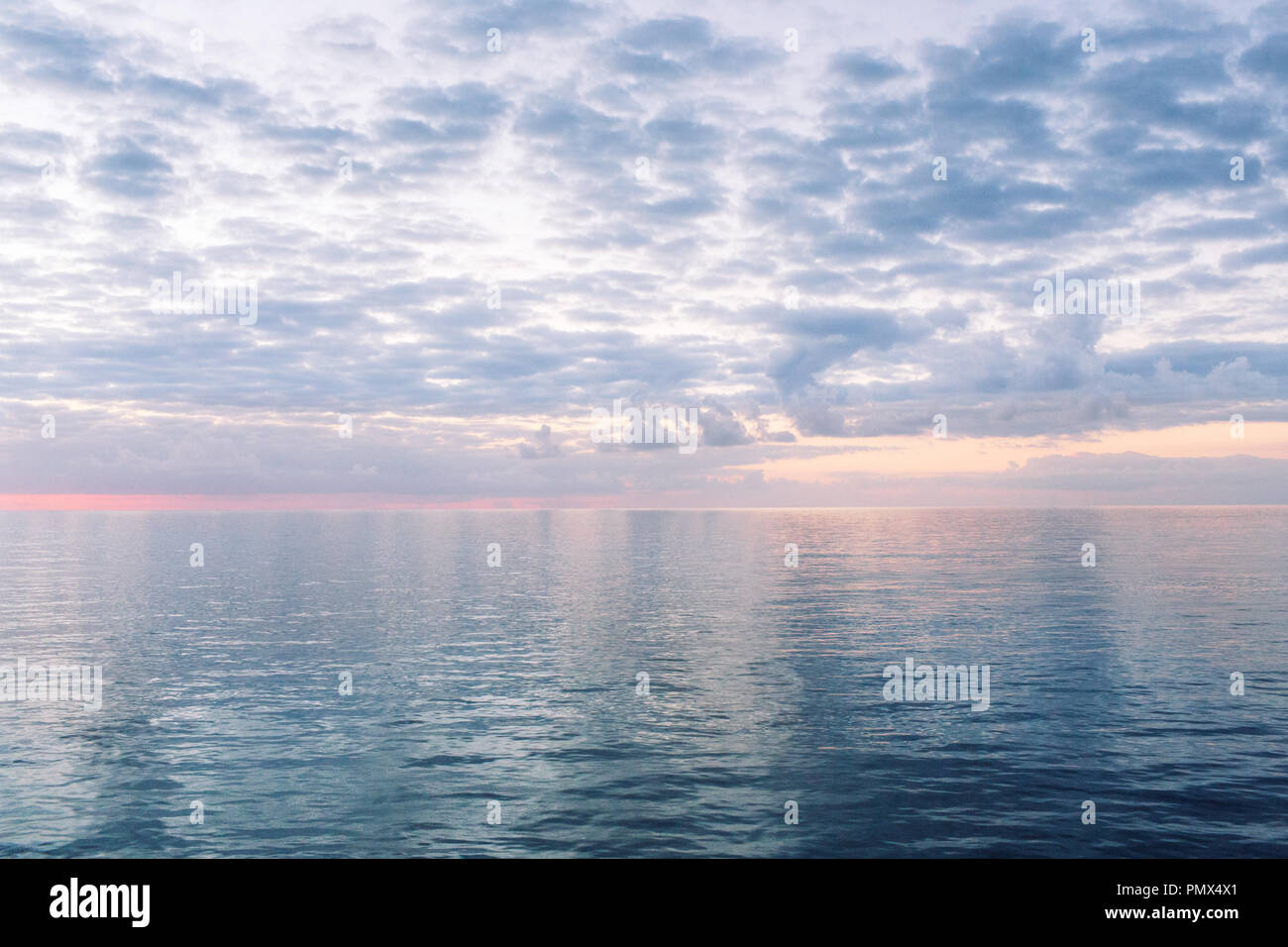 Mirrored in glassy waters hi-res stock photography and images - Alamy