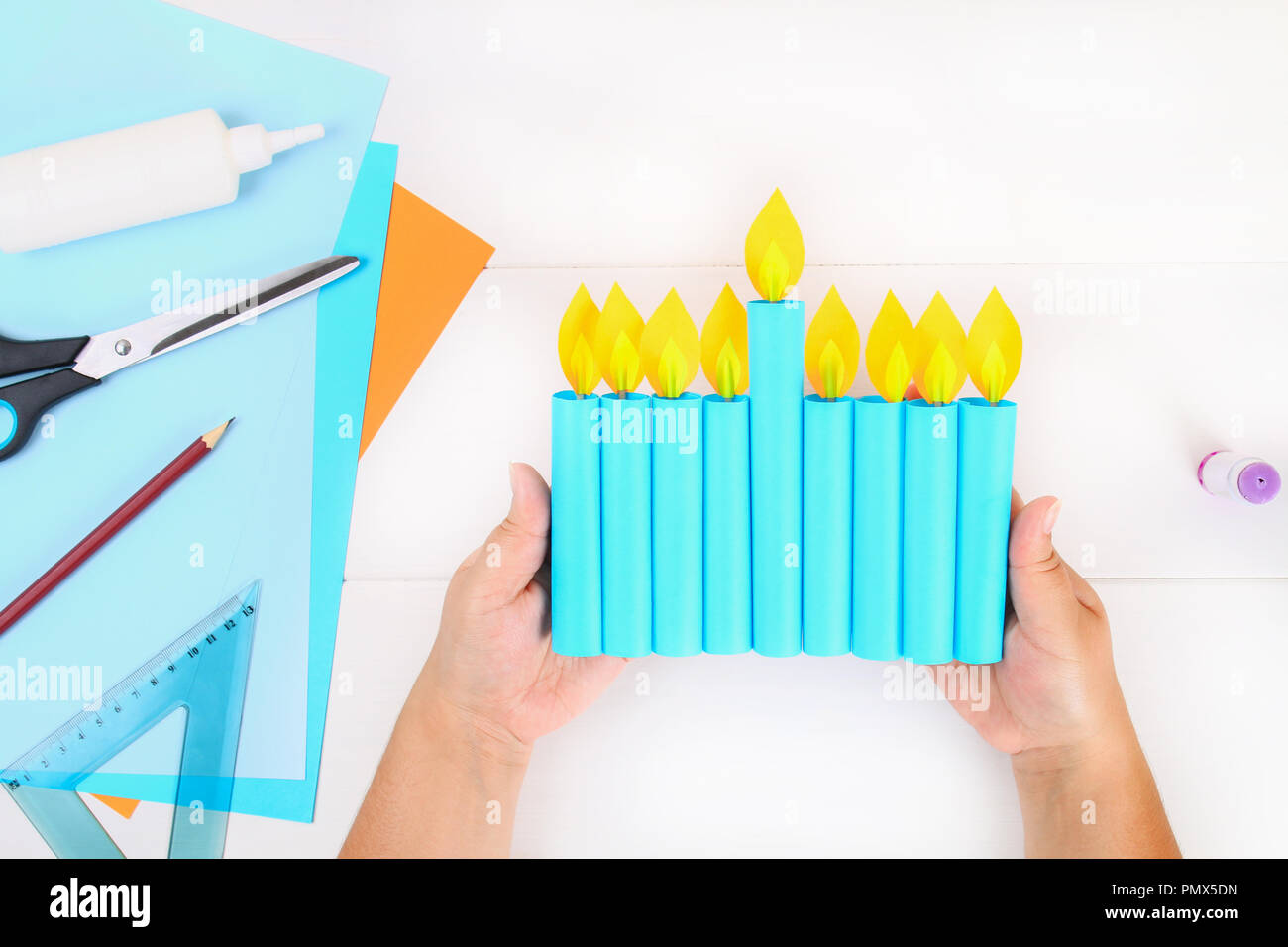 DIY. A paper menorah with his own hands made of paper. Menorah for the ...