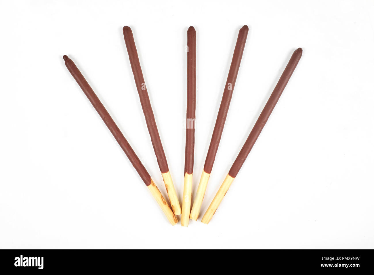 Biscuit sticks in chocolate coating on white background. Chocolate ...