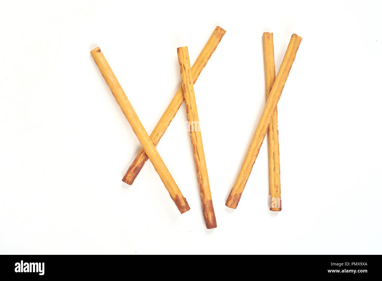 biscuit sticks with sweet filling on white background Stock Photo - Alamy