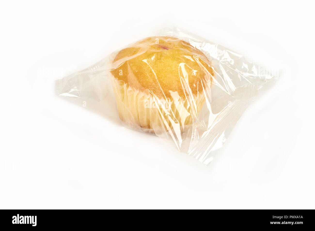 muffins packed in transparent packaging, on a white background Stock ...