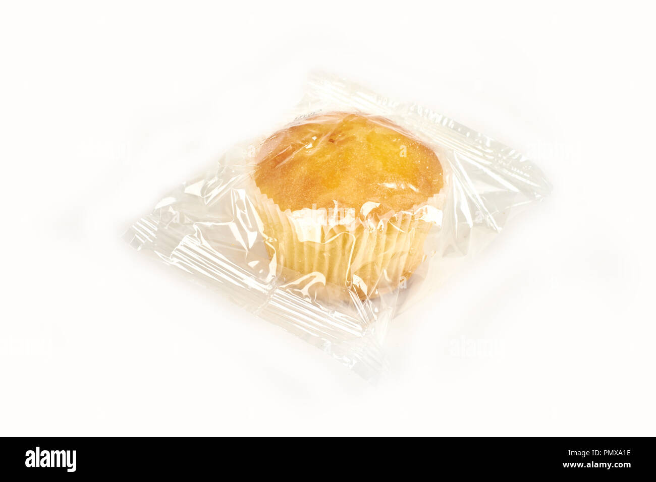 muffins packed in transparent packaging, on a white background Stock ...