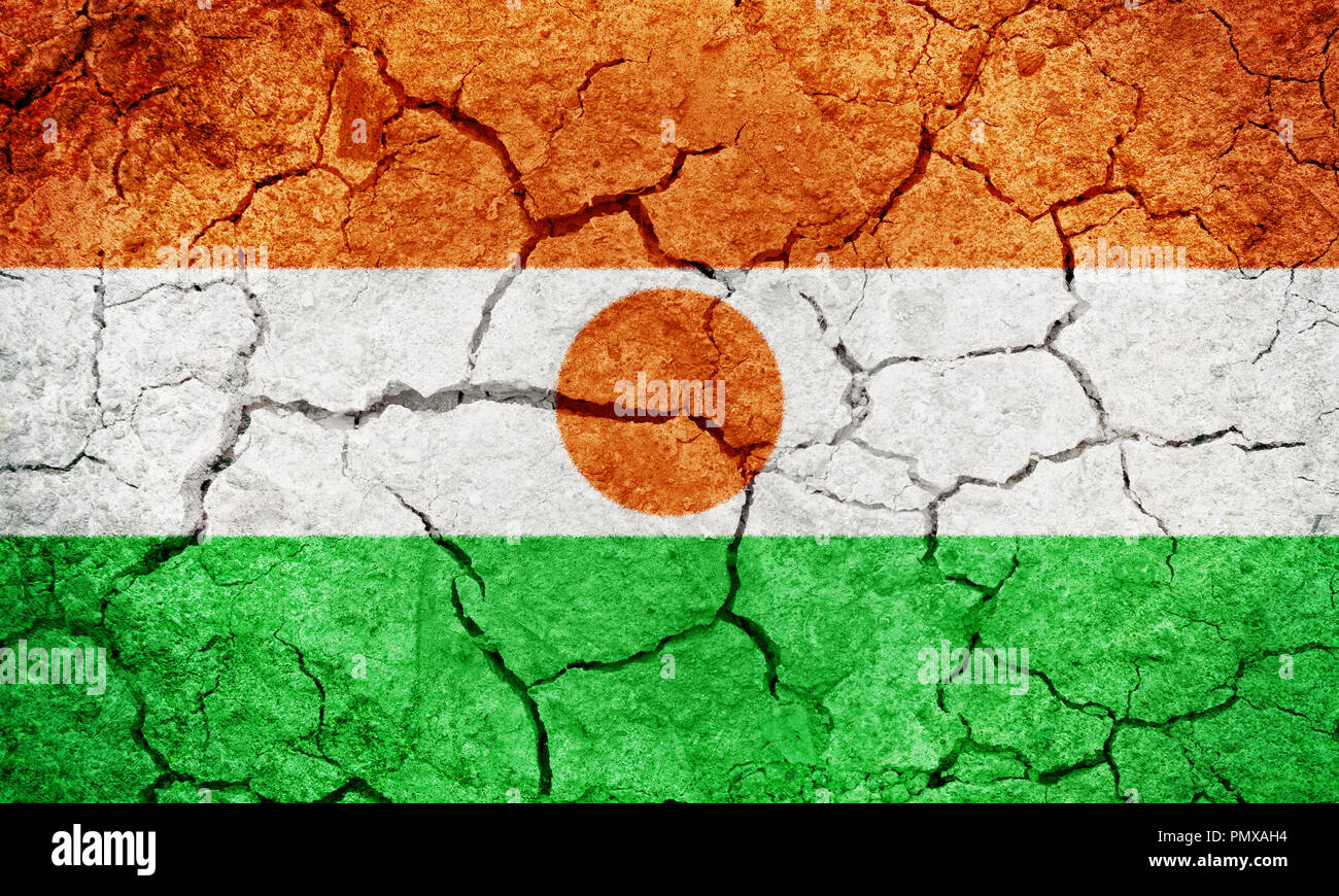 Republic of the Niger flag on dry earth ground texture background Stock ...