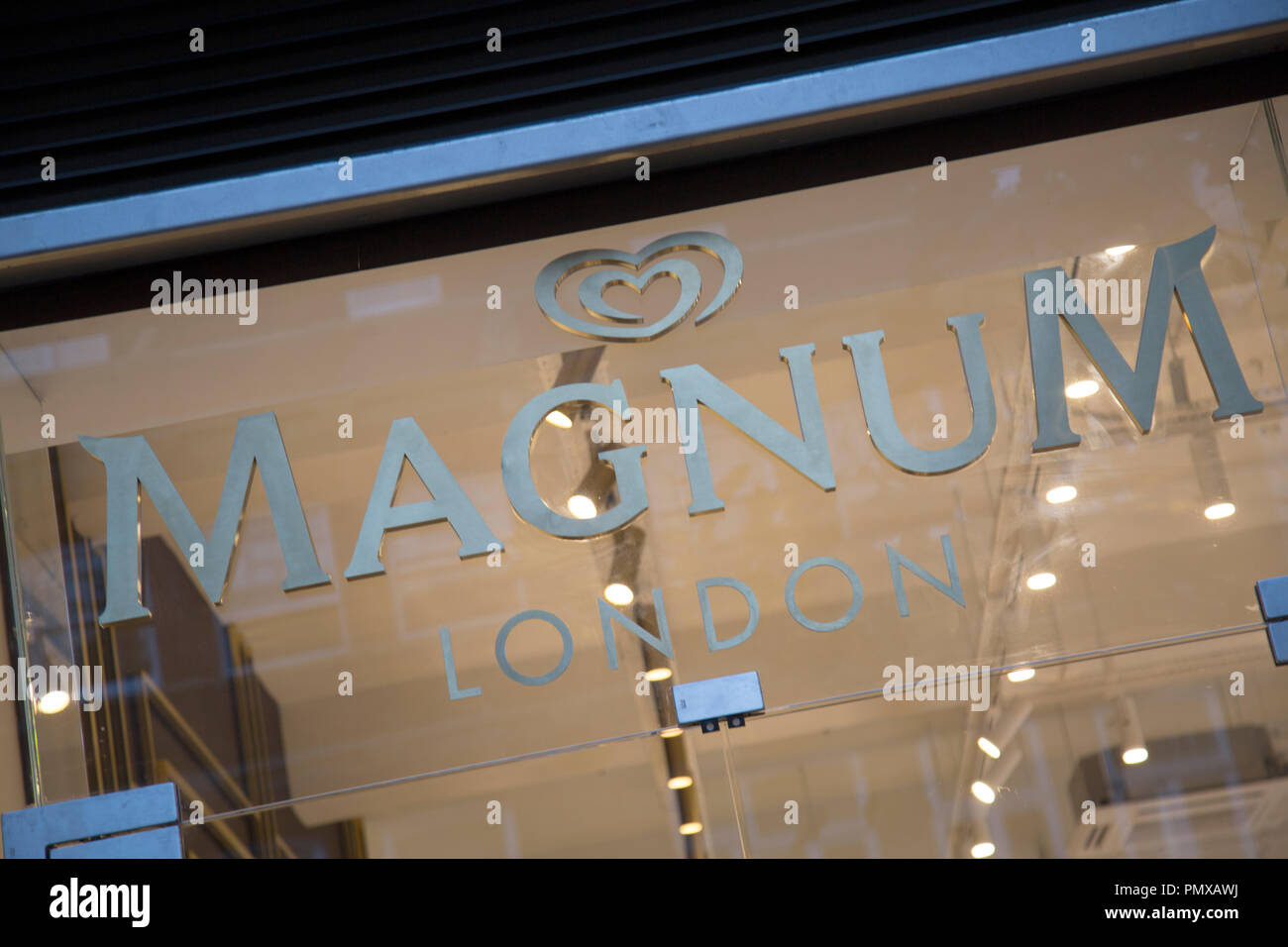 Magnum Shop Sign, Kings Road; Chelsea; London Stock Photo - Alamy