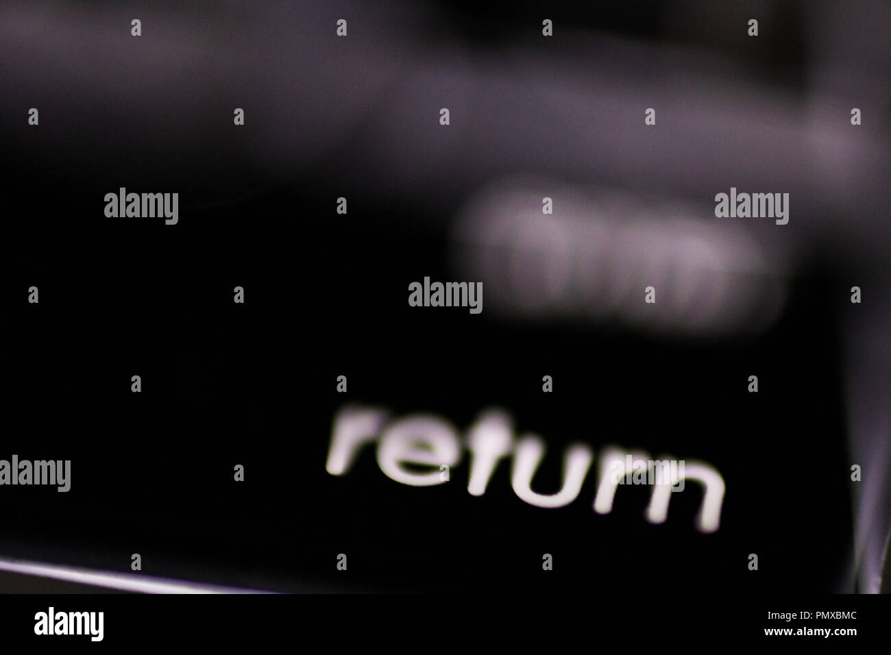 Return key on modern light gammer keyboard Stock Photo - Alamy