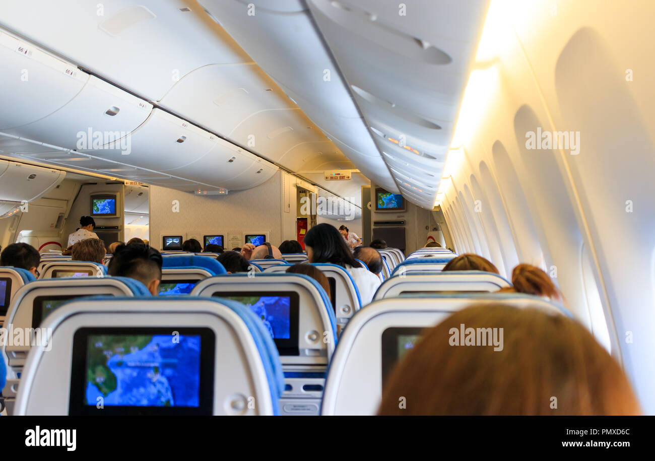 Cathay pacific plane interior hi-res stock photography and images - Alamy