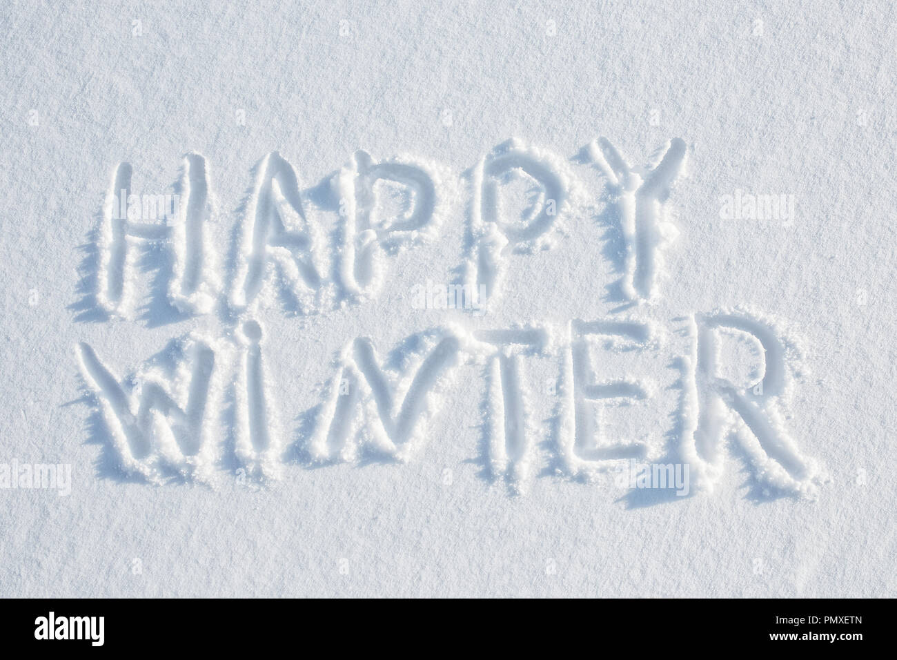 Word winter written on snow hi-res stock photography and images - Alamy