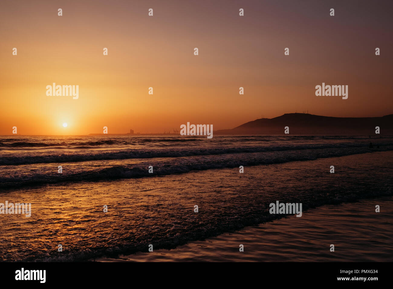 On the beach in Agadir, Morocco at Sunset Stock Photo - Alamy