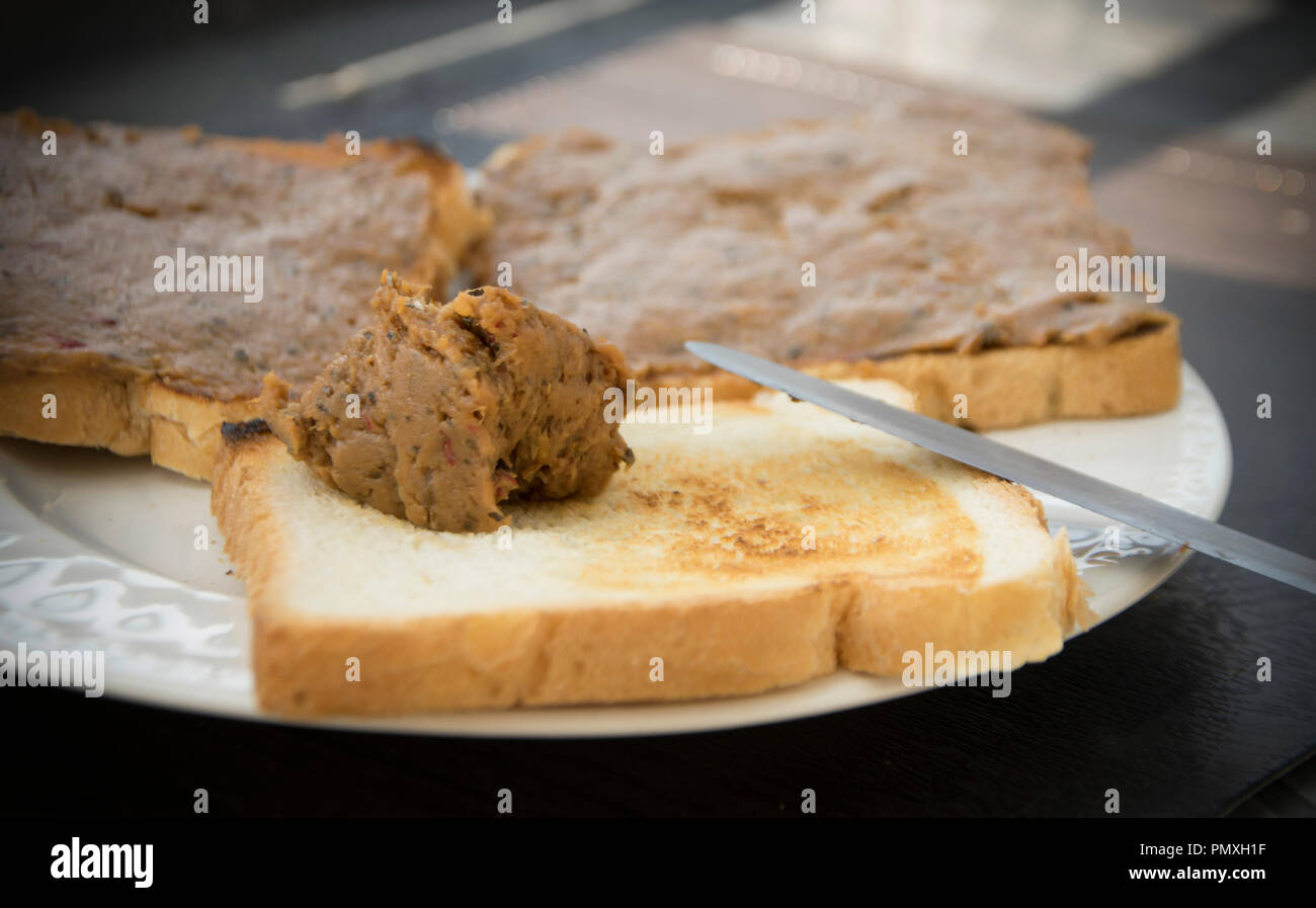 A closeup of steak tartare and toasted bread on a table Stock Photo - Alamy