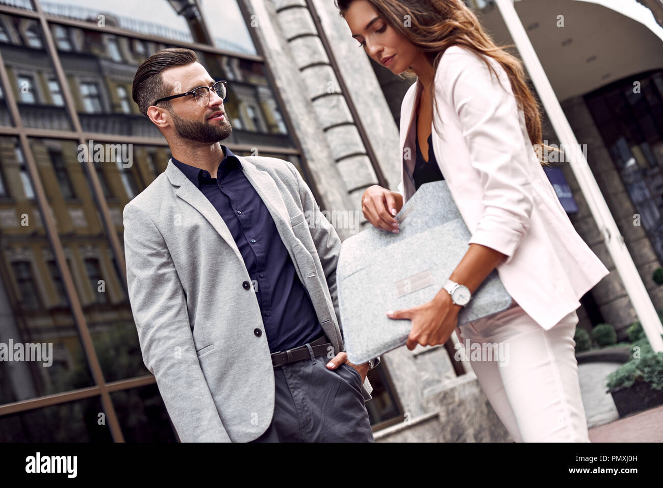 Business people waiting outside office hi-res stock photography and ...