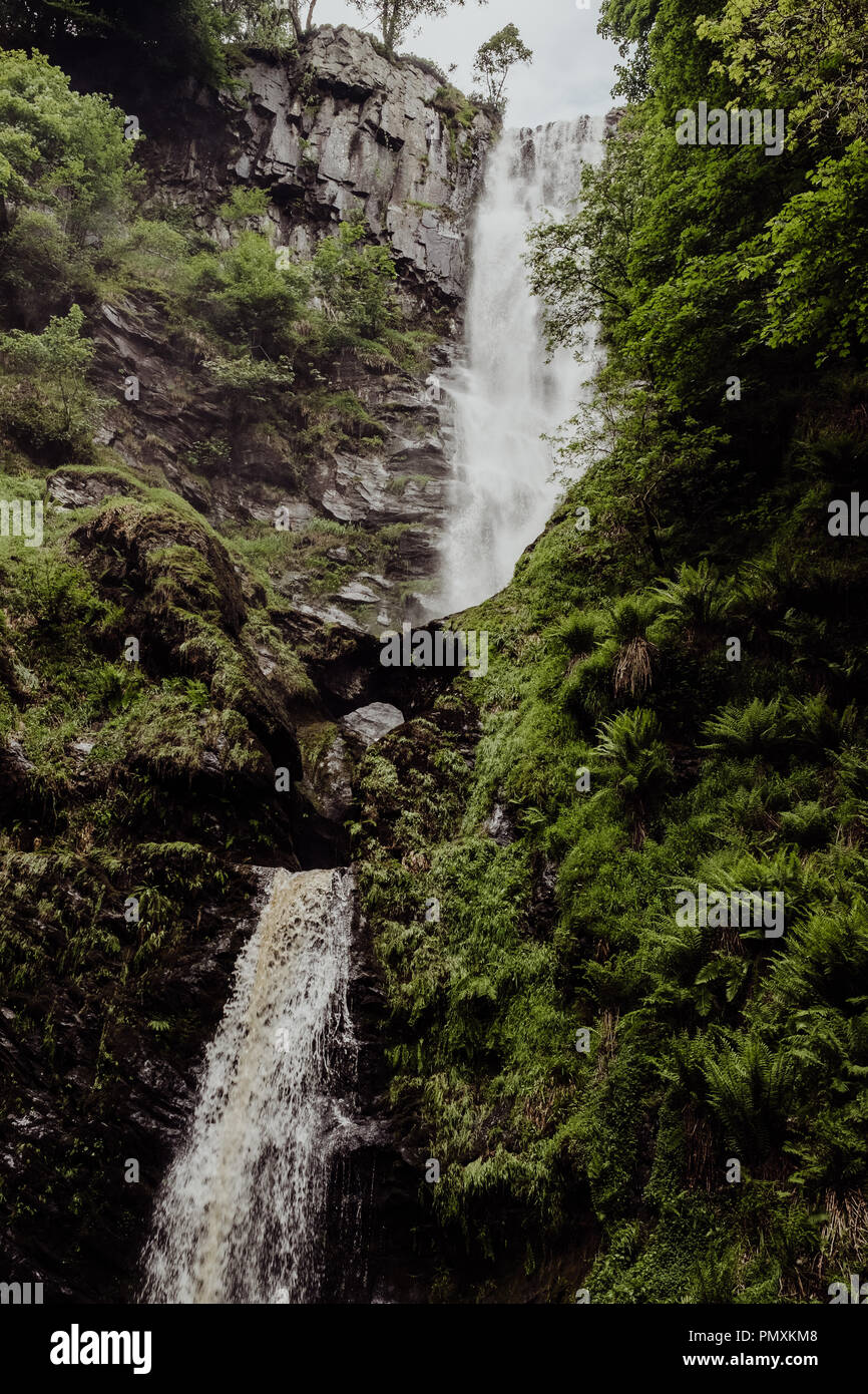 Hiking the landscape by Pistyll Rhaeadr waterfall in North Wales Stock ...