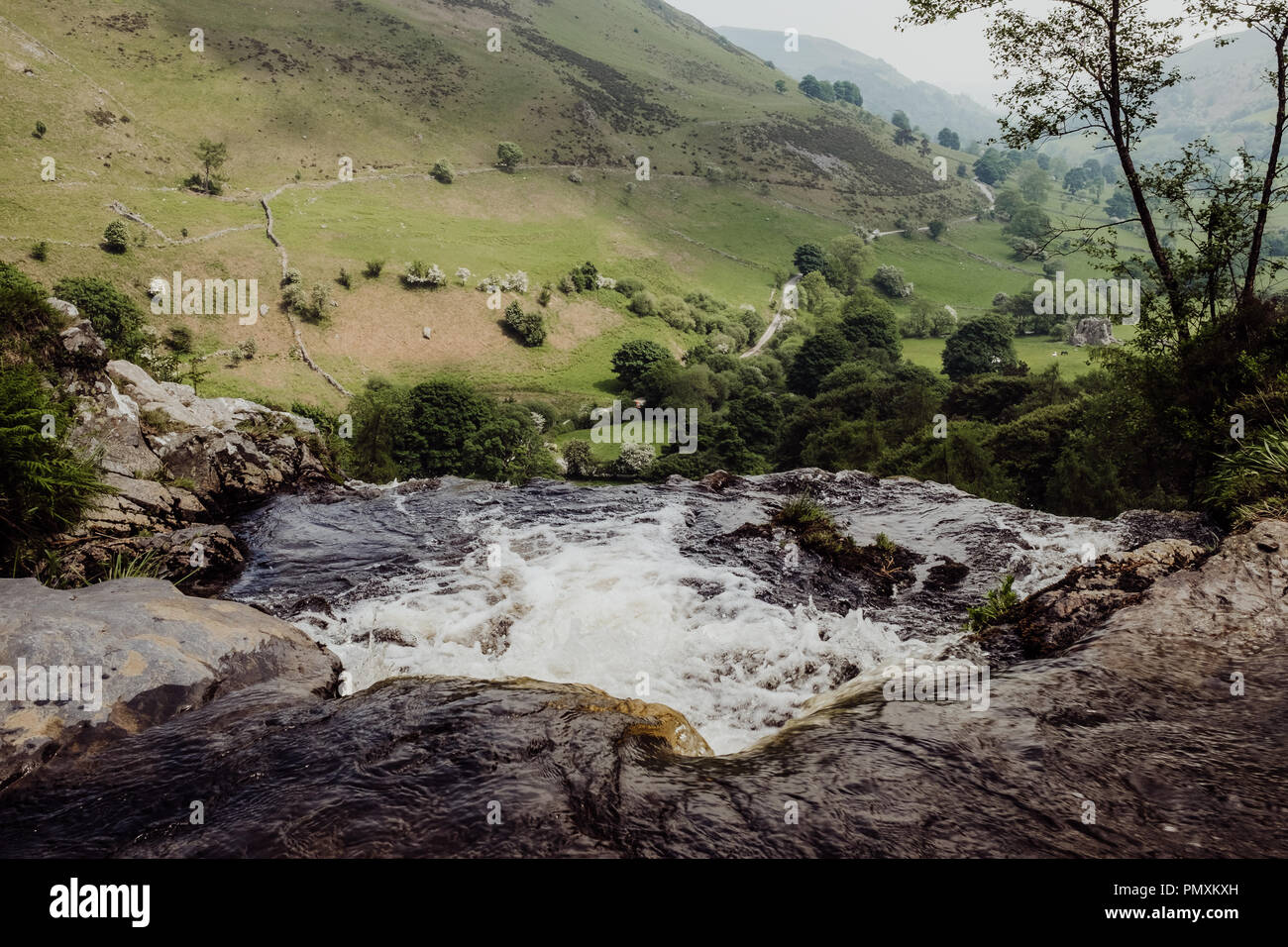Hiking the landscape by Pistyll Rhaeadr waterfall in North Wales Stock ...