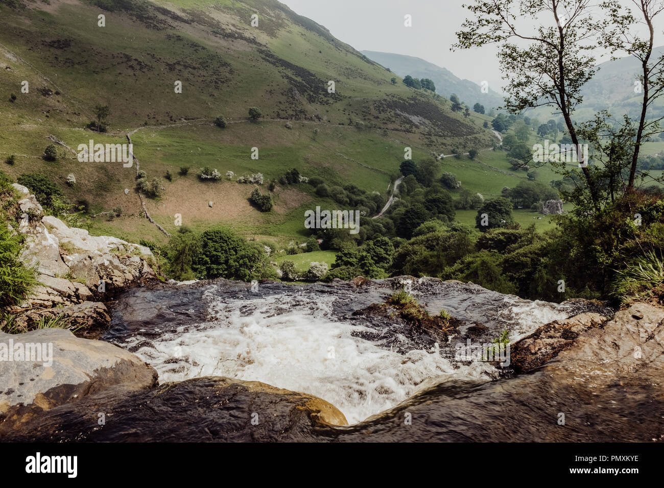 Hiking the landscape by Pistyll Rhaeadr waterfall in North Wales Stock ...