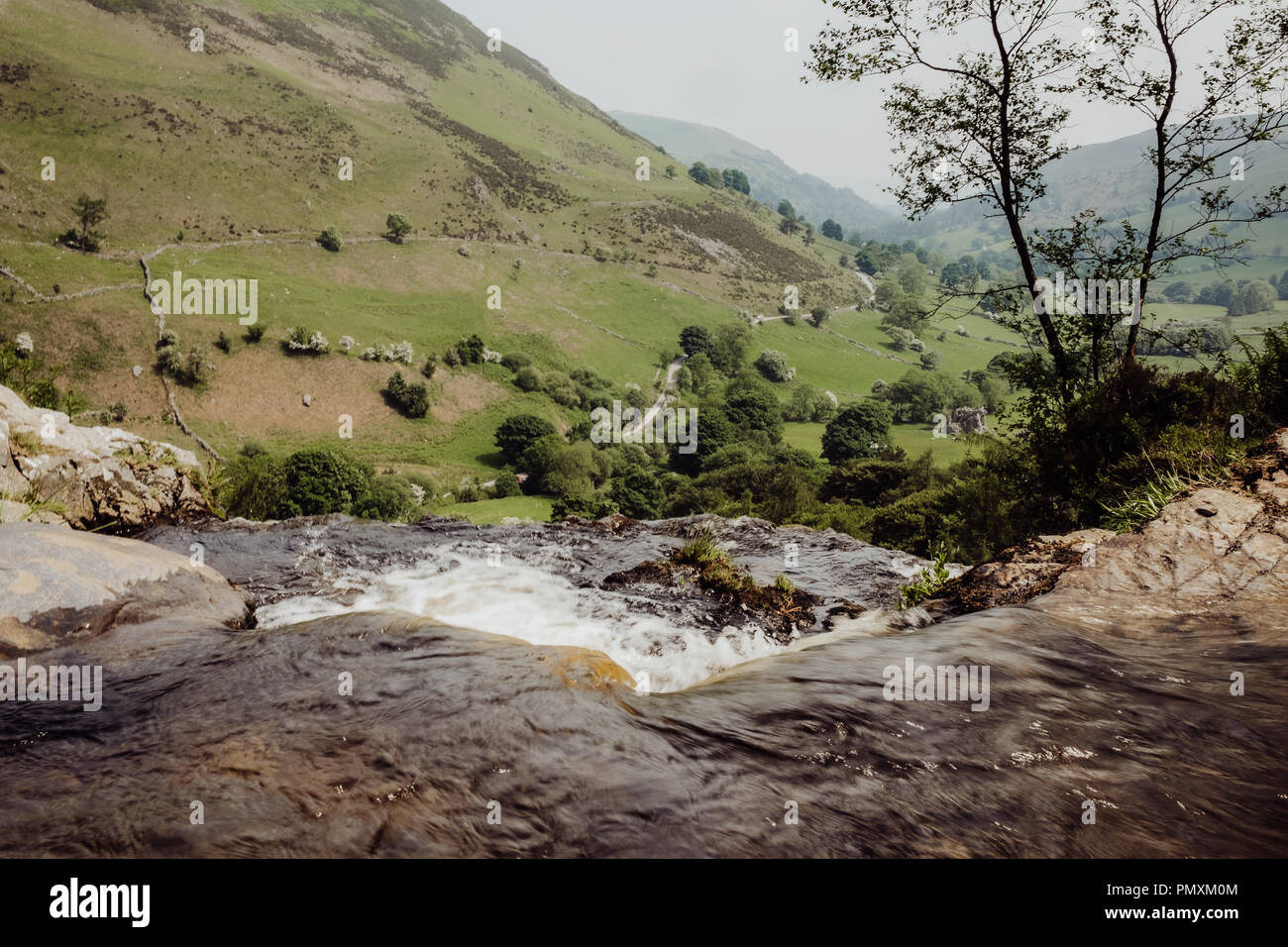 Hiking the landscape by Pistyll Rhaeadr waterfall in North Wales Stock ...