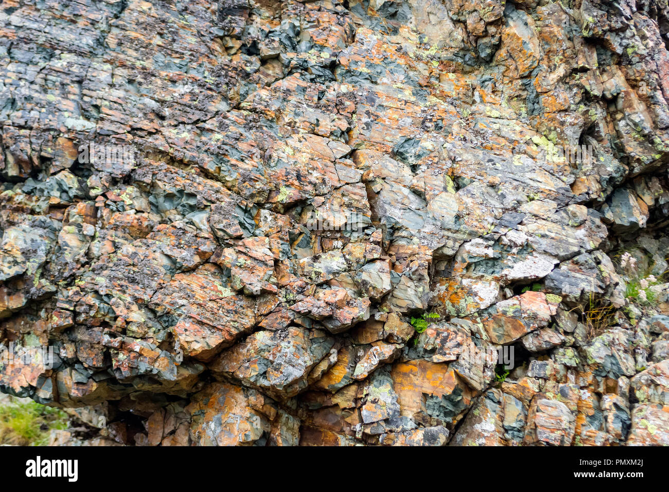 Background texture of a gray brown stone on the rock of the mountain ...