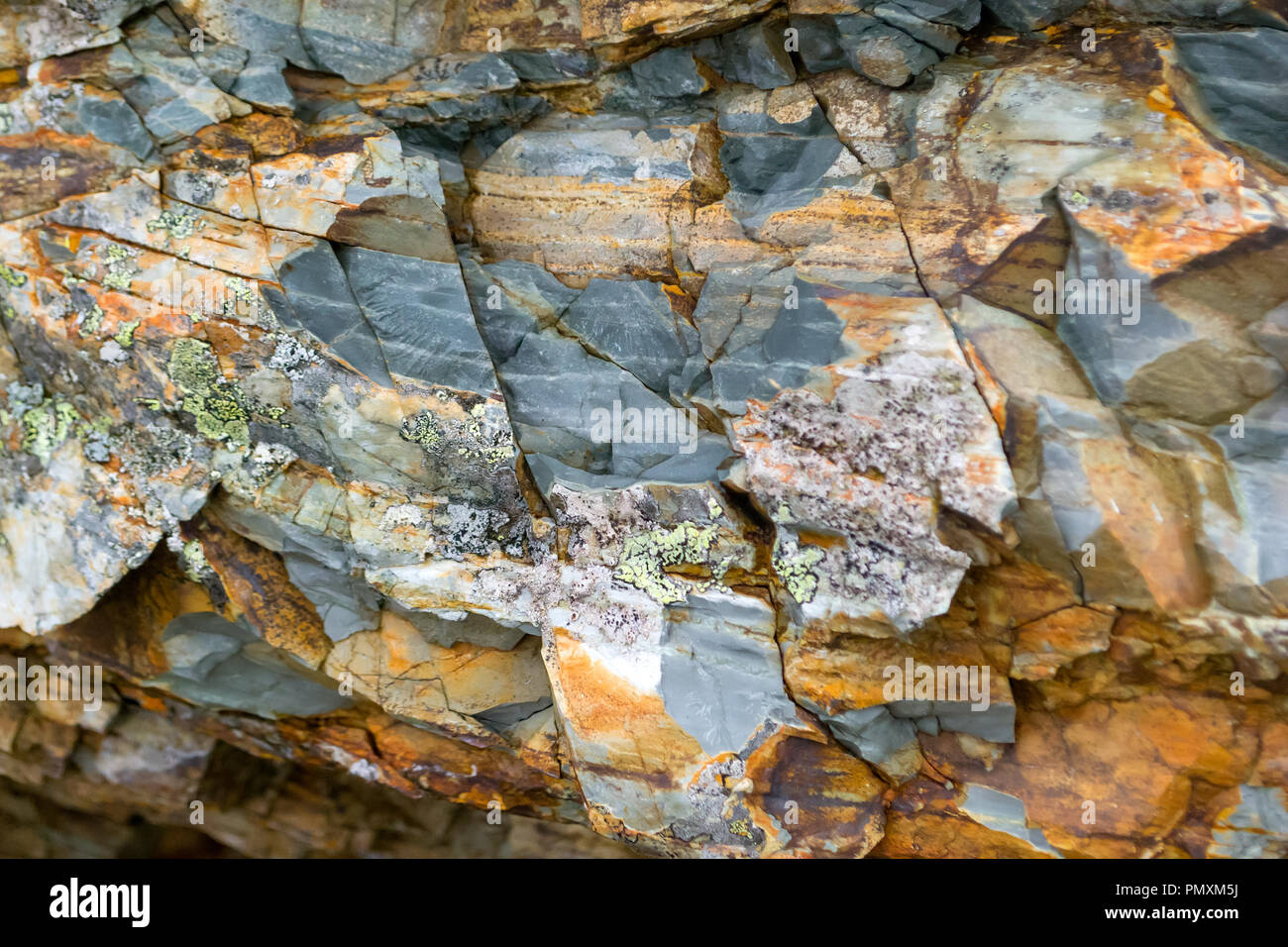 Background texture of a gray brown stone on the rock of the mountain ...