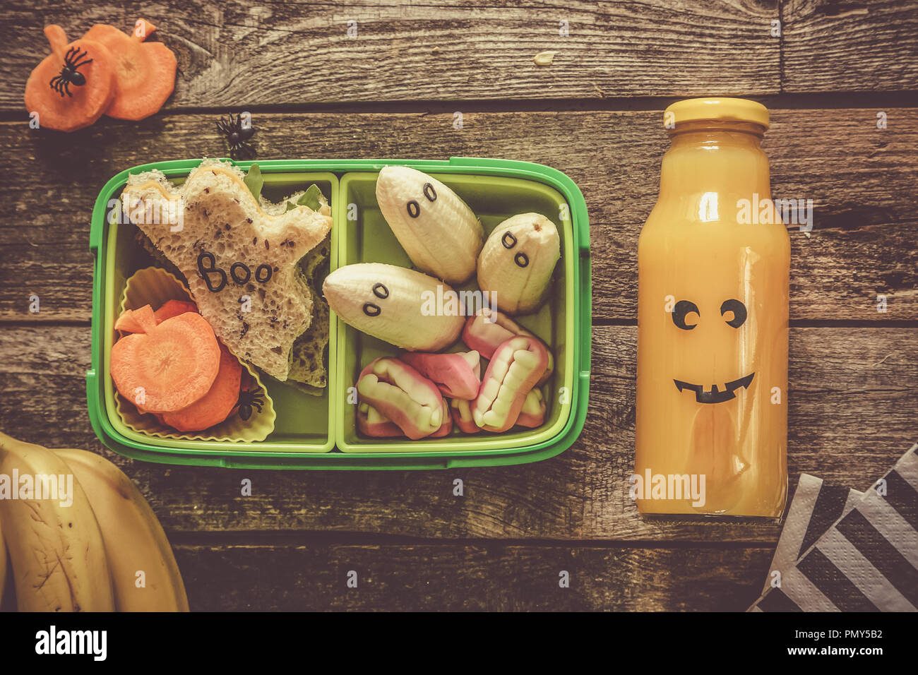 Halloween style school lunch box - ghost sandwich, pumpkin carrots ...