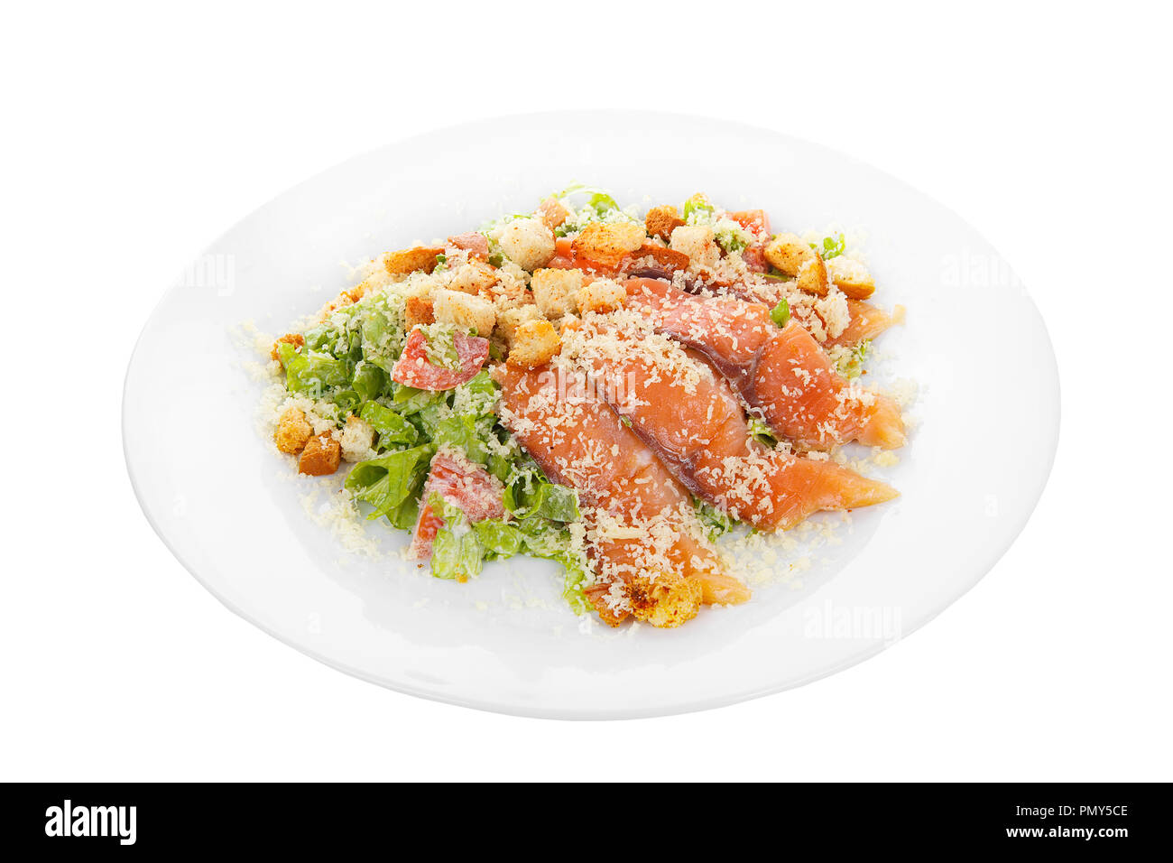 Caesar salad with fish lobes, salmon, trout, biscuits, tomato, lettuce ...