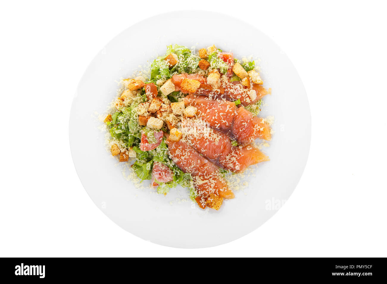 Caesar salad with fish lobes, salmon, trout, biscuits, tomato, lettuce ...