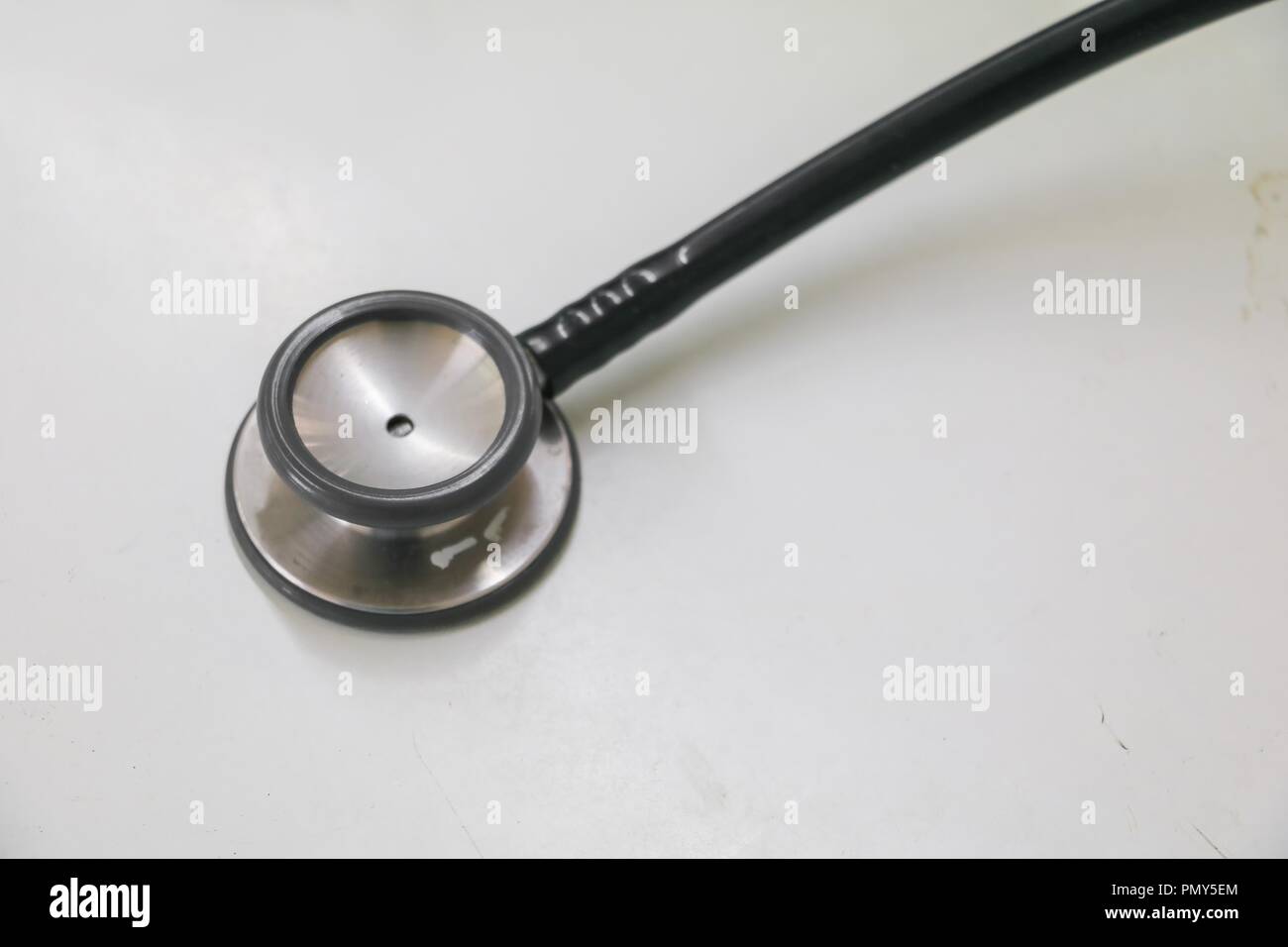 medical stethoscope in Clinic, old used long-standing on the table with ...