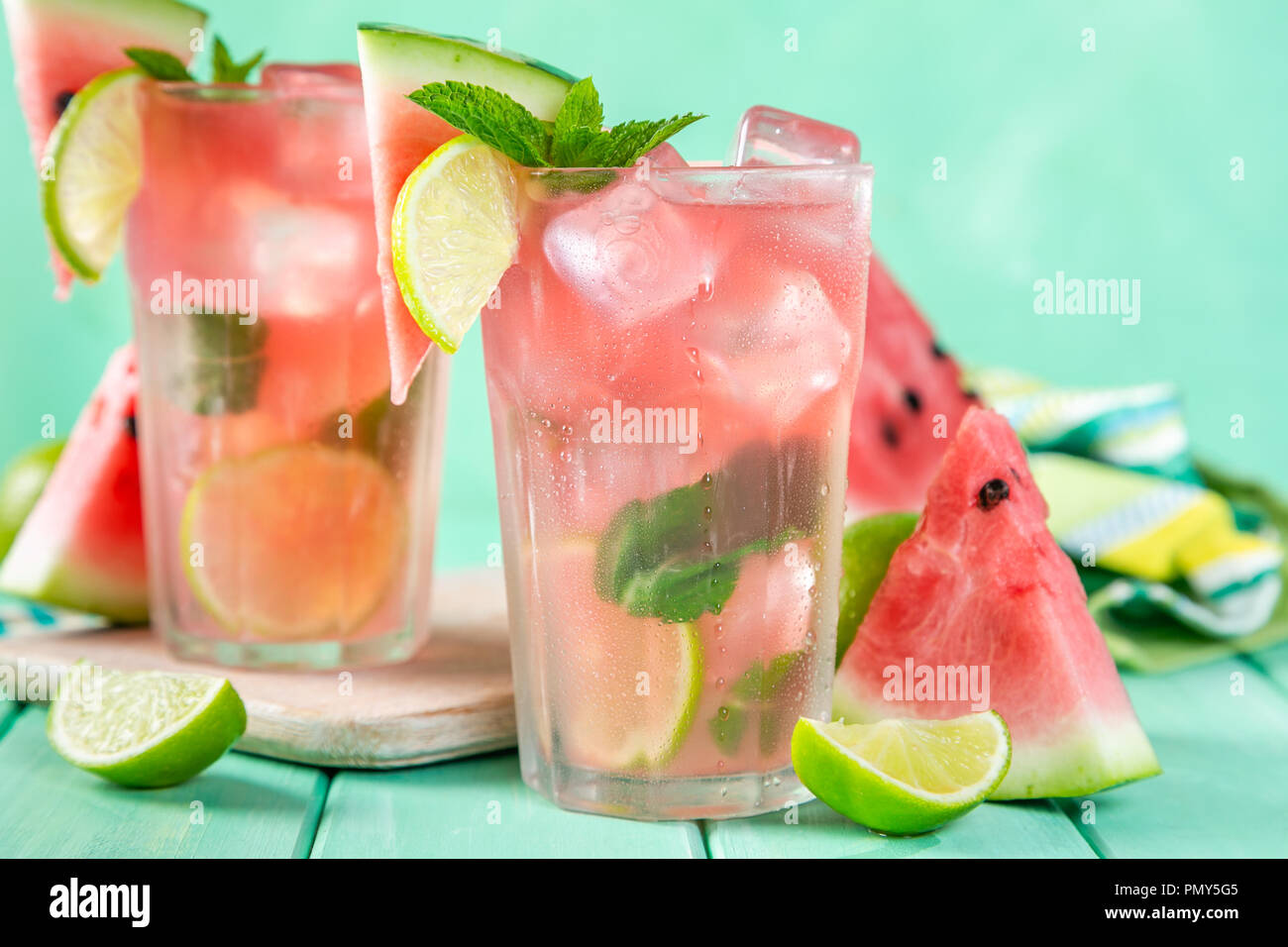 Watermelon lemonade with lime and mint, wood background Stock Photo - Alamy