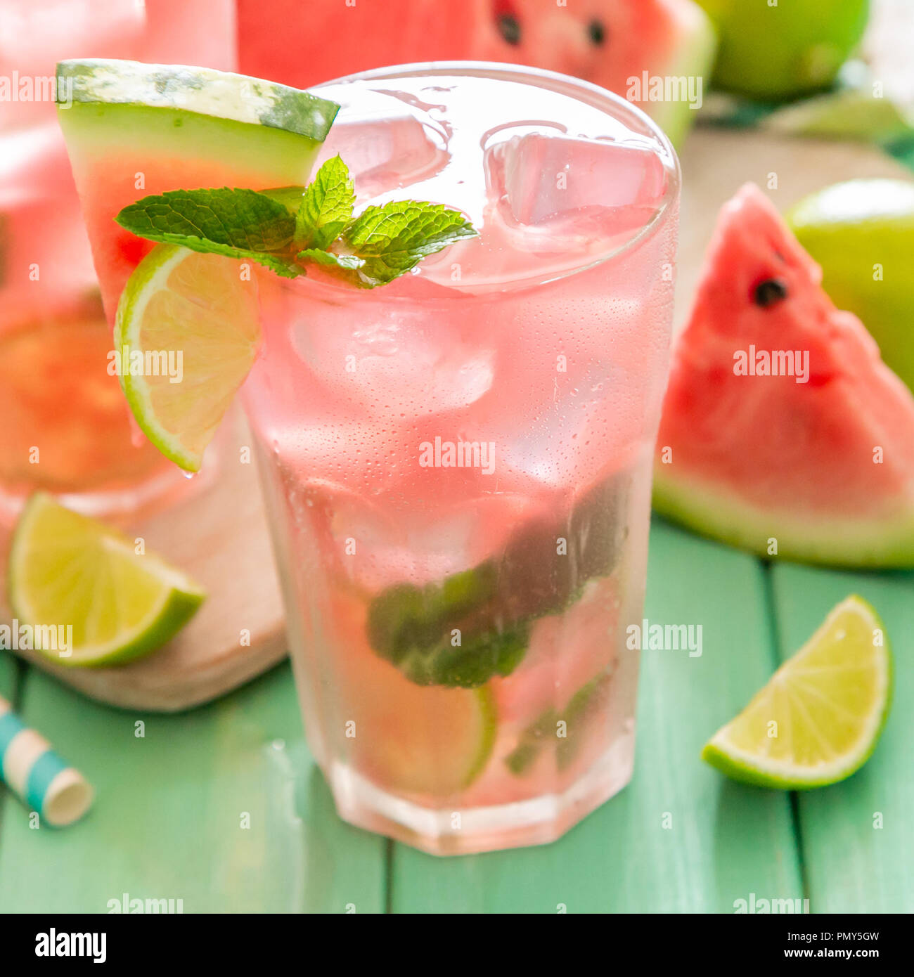 Watermelon lemonade with lime and mint, wood background Stock Photo - Alamy