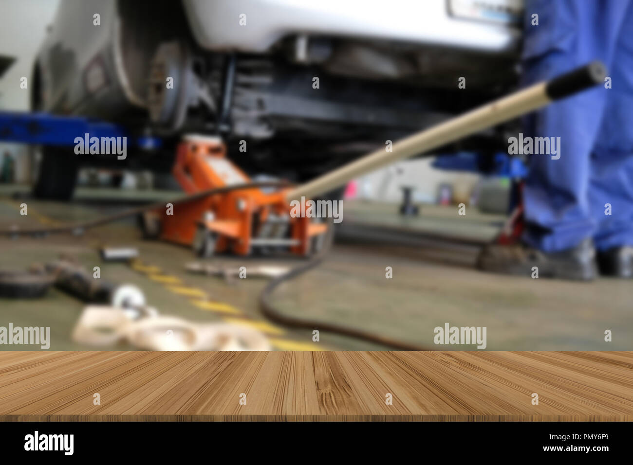 car lift up for shock absorber & spring replacement in auto service ...