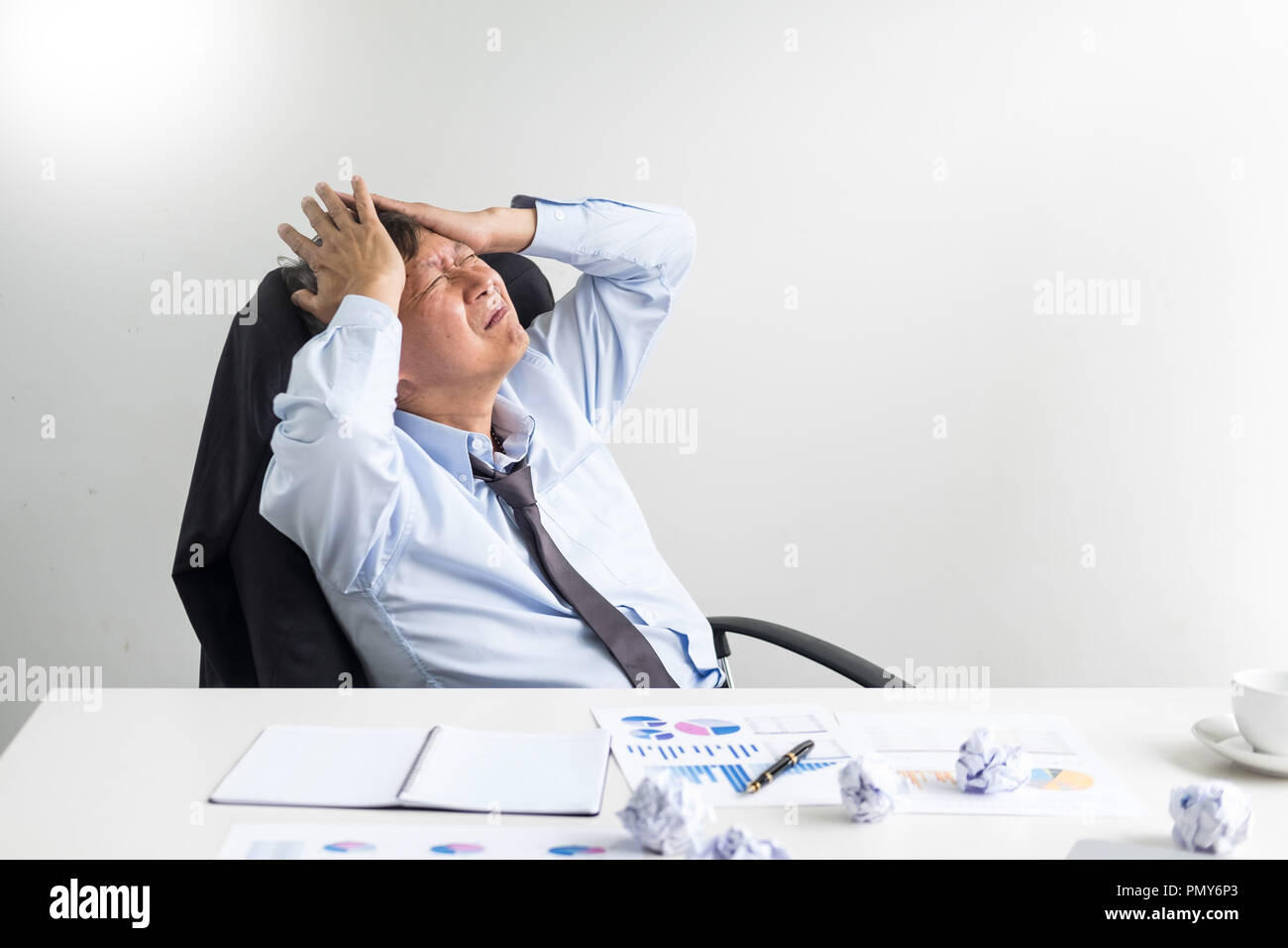 Depressed failure and tired businessman late sad and solving problem in ...