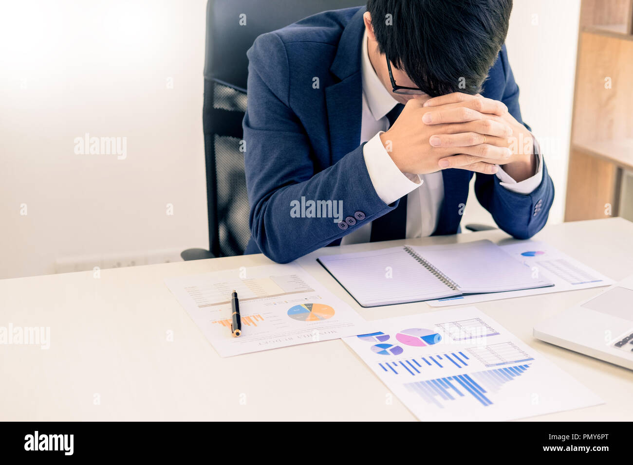 Depressed failure and tired businessman late sad and solving problem in ...