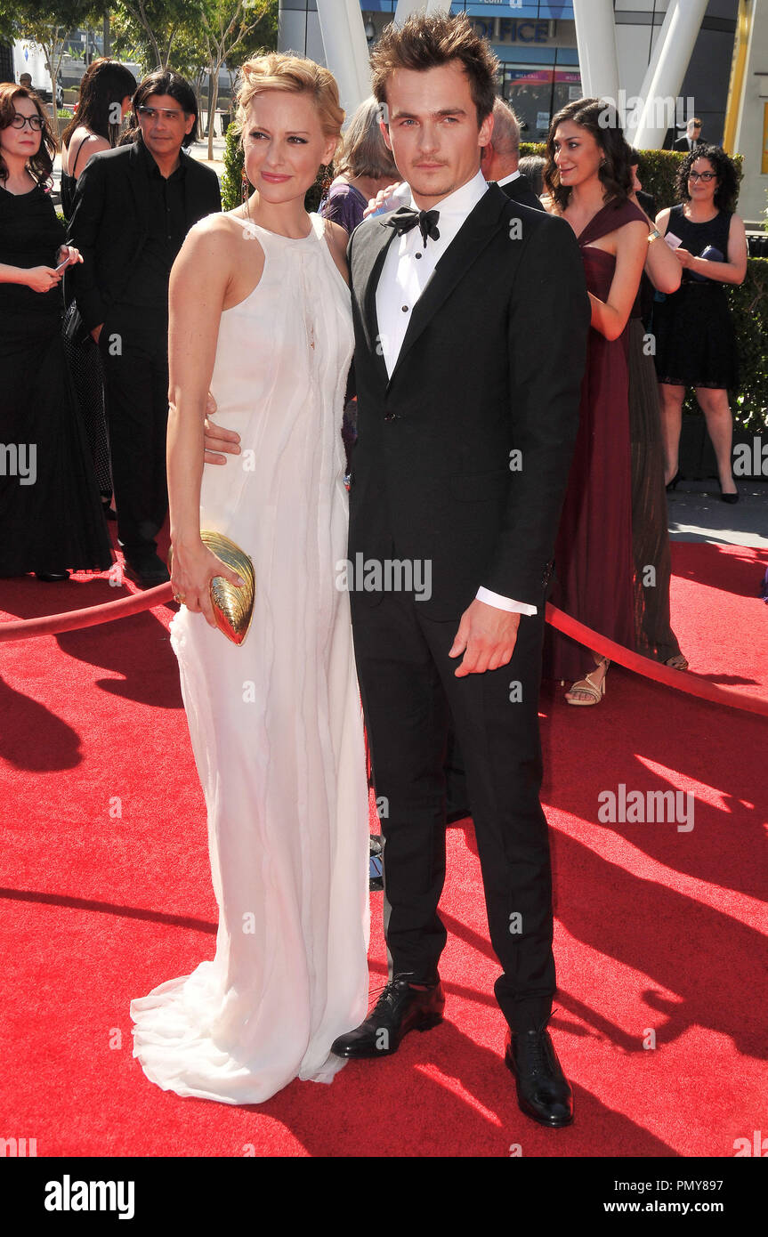 Rupert Friend & Guest at the 2013 Creative Arts Emmy Awards held at the ...