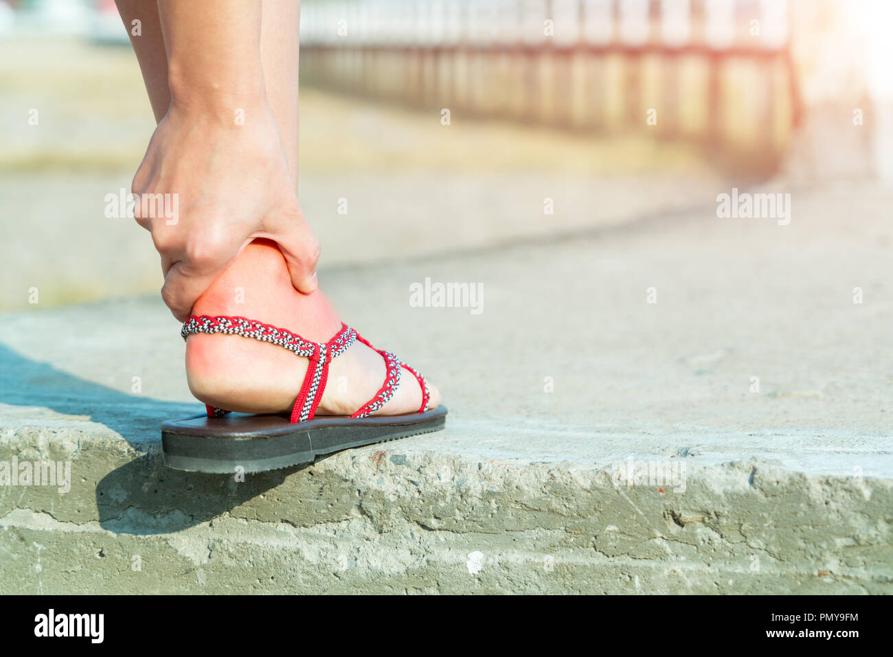 leg ankle injury painful women touching the leg painful with red ...