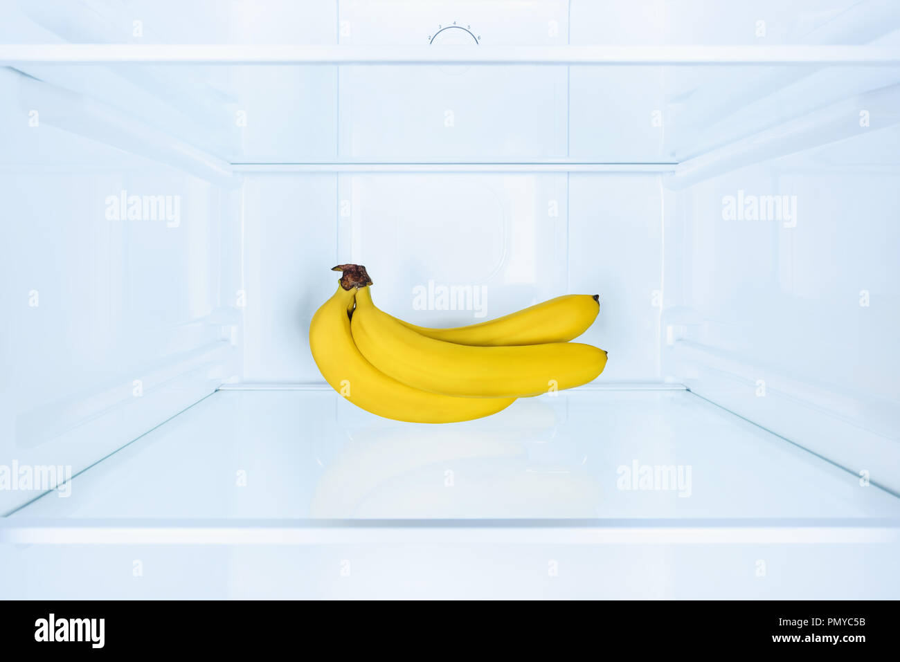 ripe tasty bananas on shelf in fridge Stock Photo - Alamy